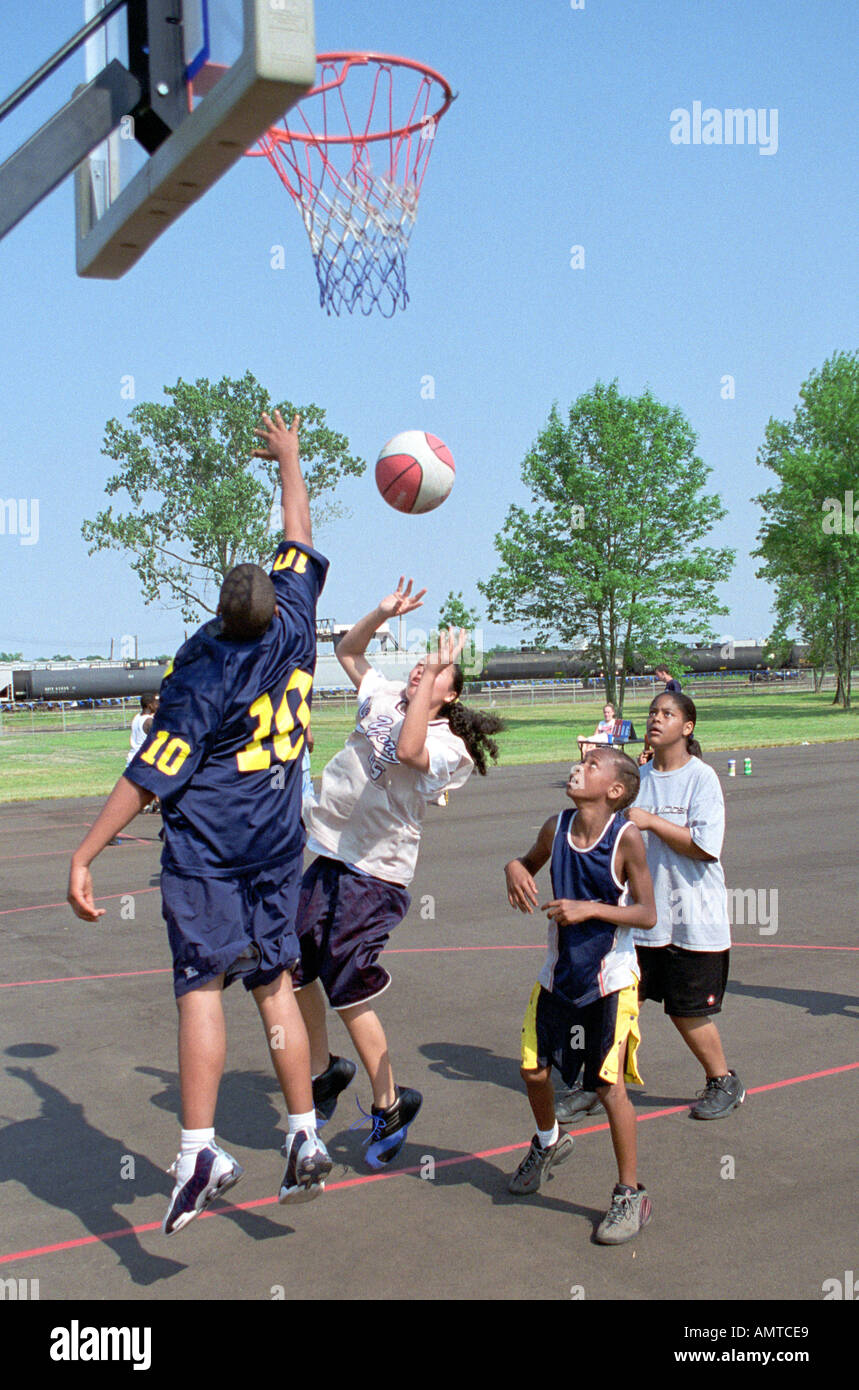 Male vs female co ed outdoor Basketball action Stock Photo - Alamy