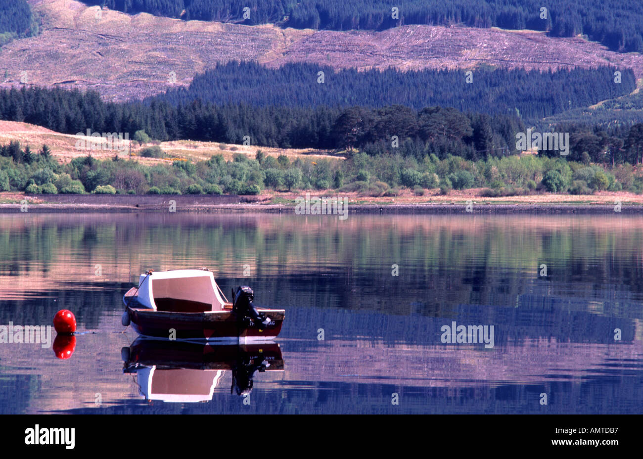 Boat and reflection Loch Eil Scottish Highlands Stock Photo - Alamy