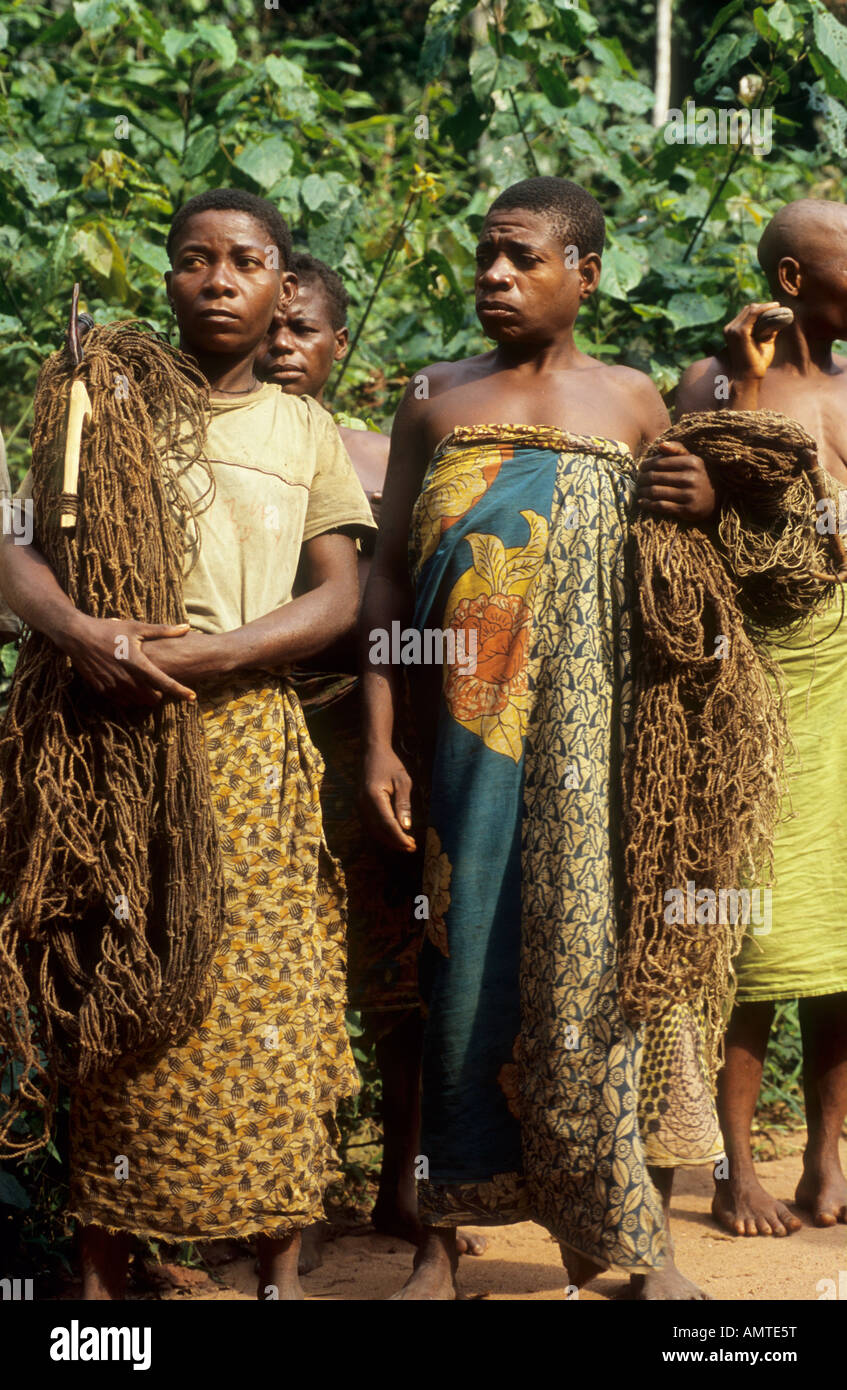 Group of pygmy women waiting to start net hunt in the forest Stock ...