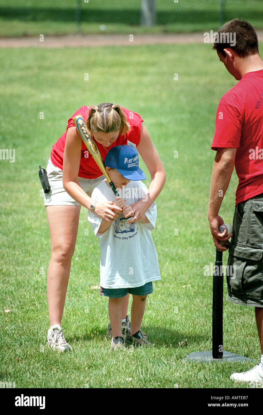 4 and 5 year old boys and girls learn how to hit a ball off of a tee ...
