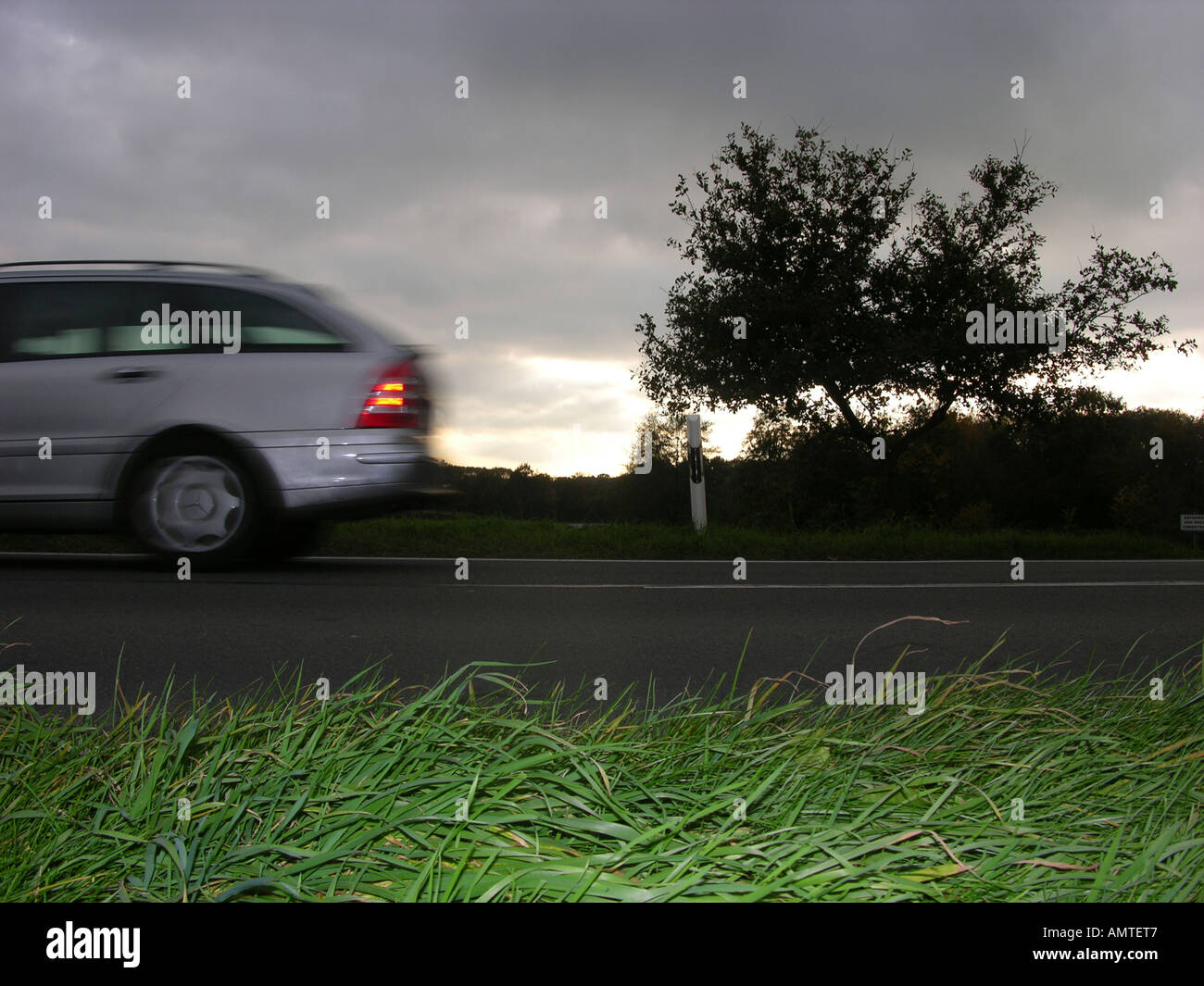 Car speeding country lane hi-res stock photography and images - Alamy