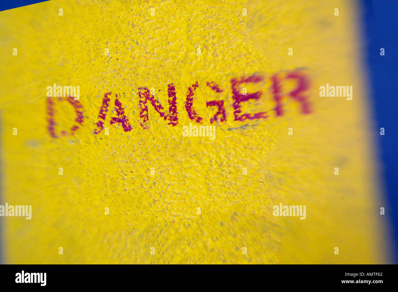 Blue and yellow danger sign hi-res stock photography and images - Alamy