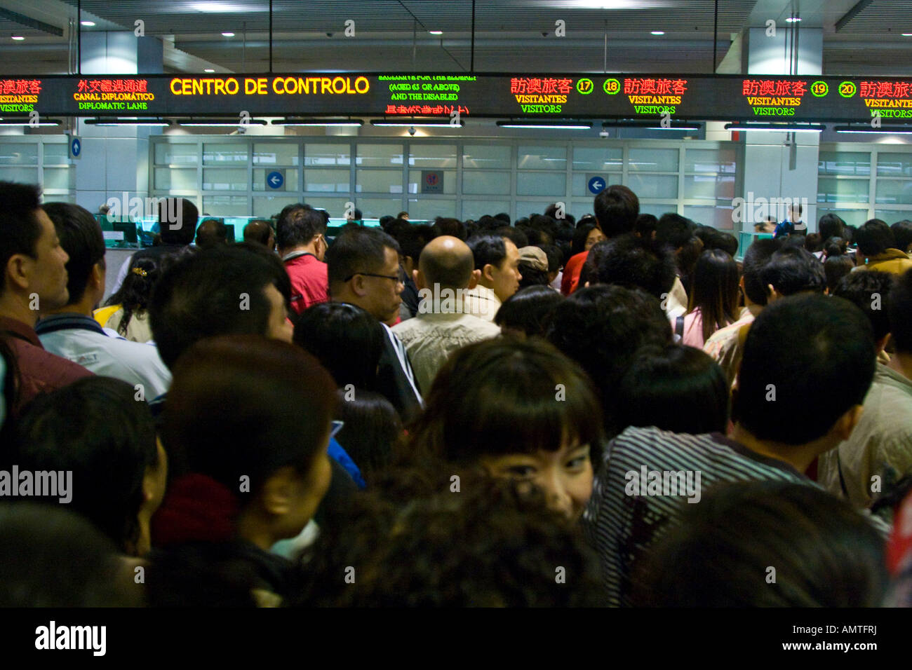 Chinese People Wait to Enter Macau at the Border Crossing Between Macau ...