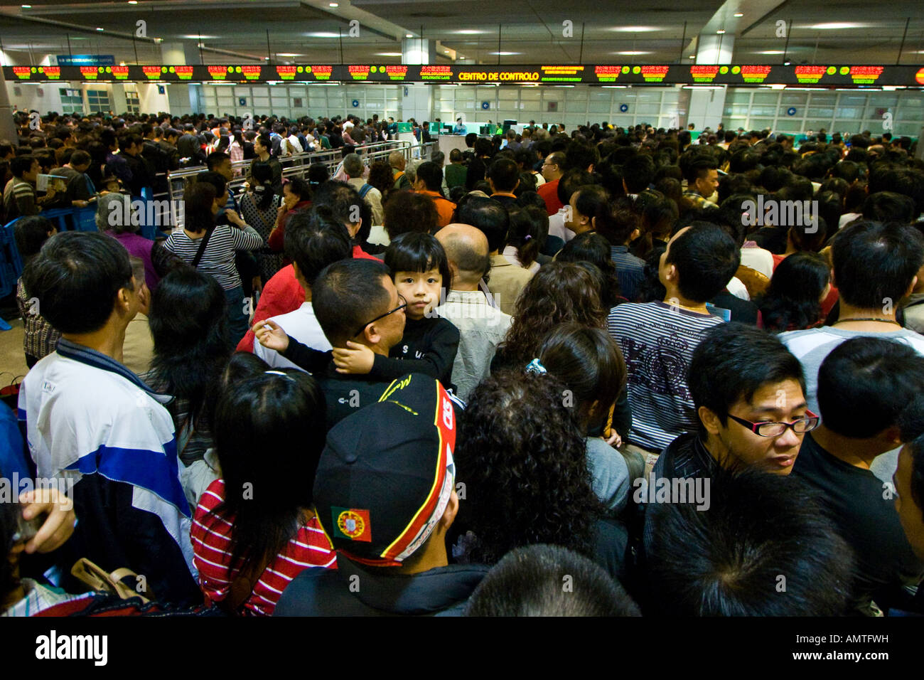 Chinese People Wait to Enter Macau at the Border Crossing Between Macau ...