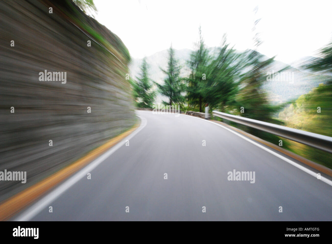 speed on the street curve Stock Photo - Alamy