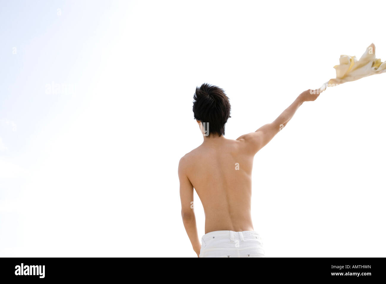 Back figure of Japanese man Stock Photo - Alamy