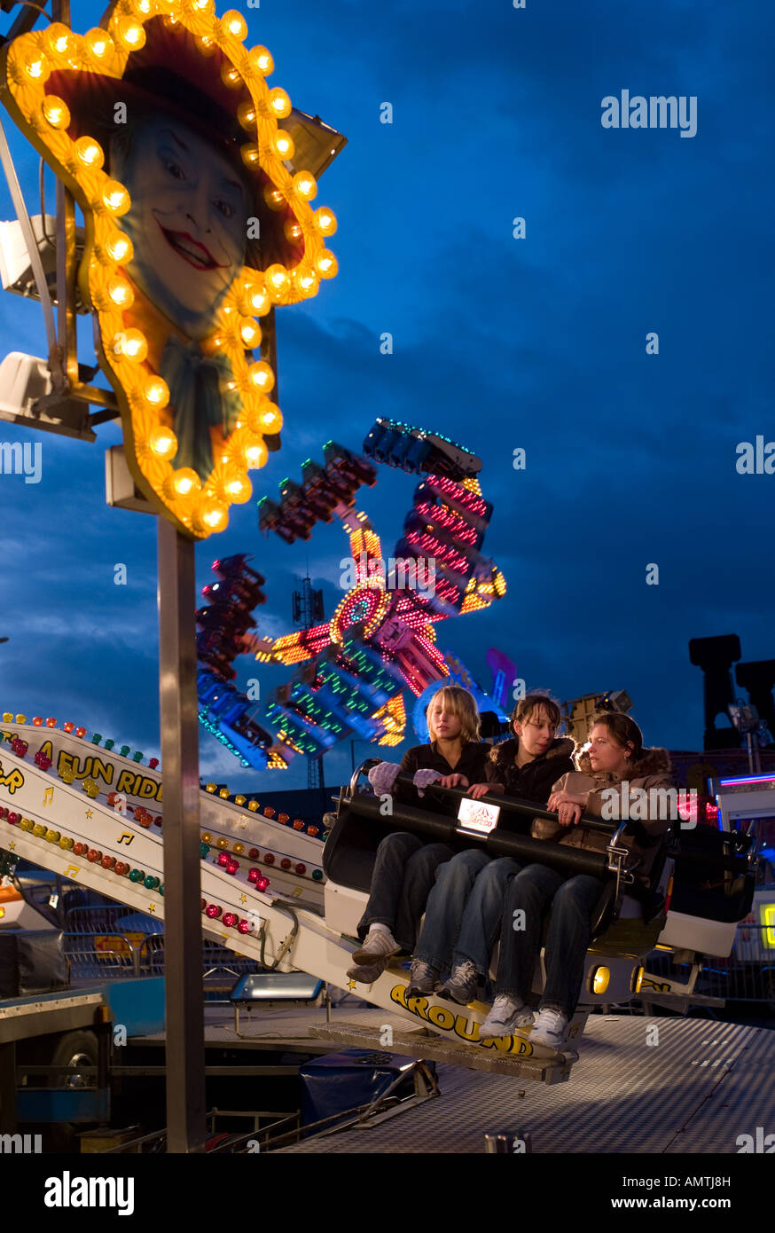 Girls on funfair ride on hi-res stock photography and images - Alamy