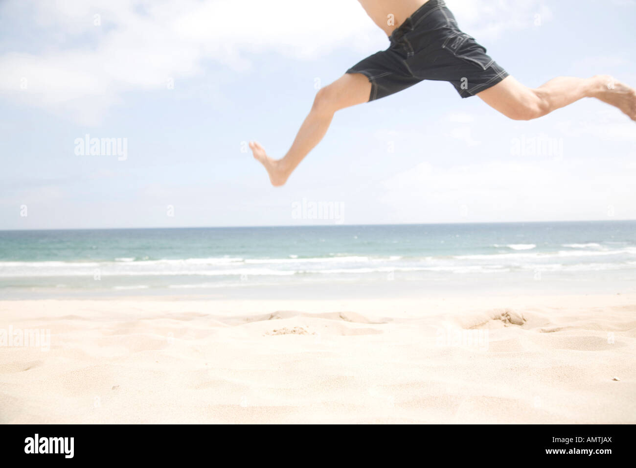 Japanese man jumping Stock Photo - Alamy