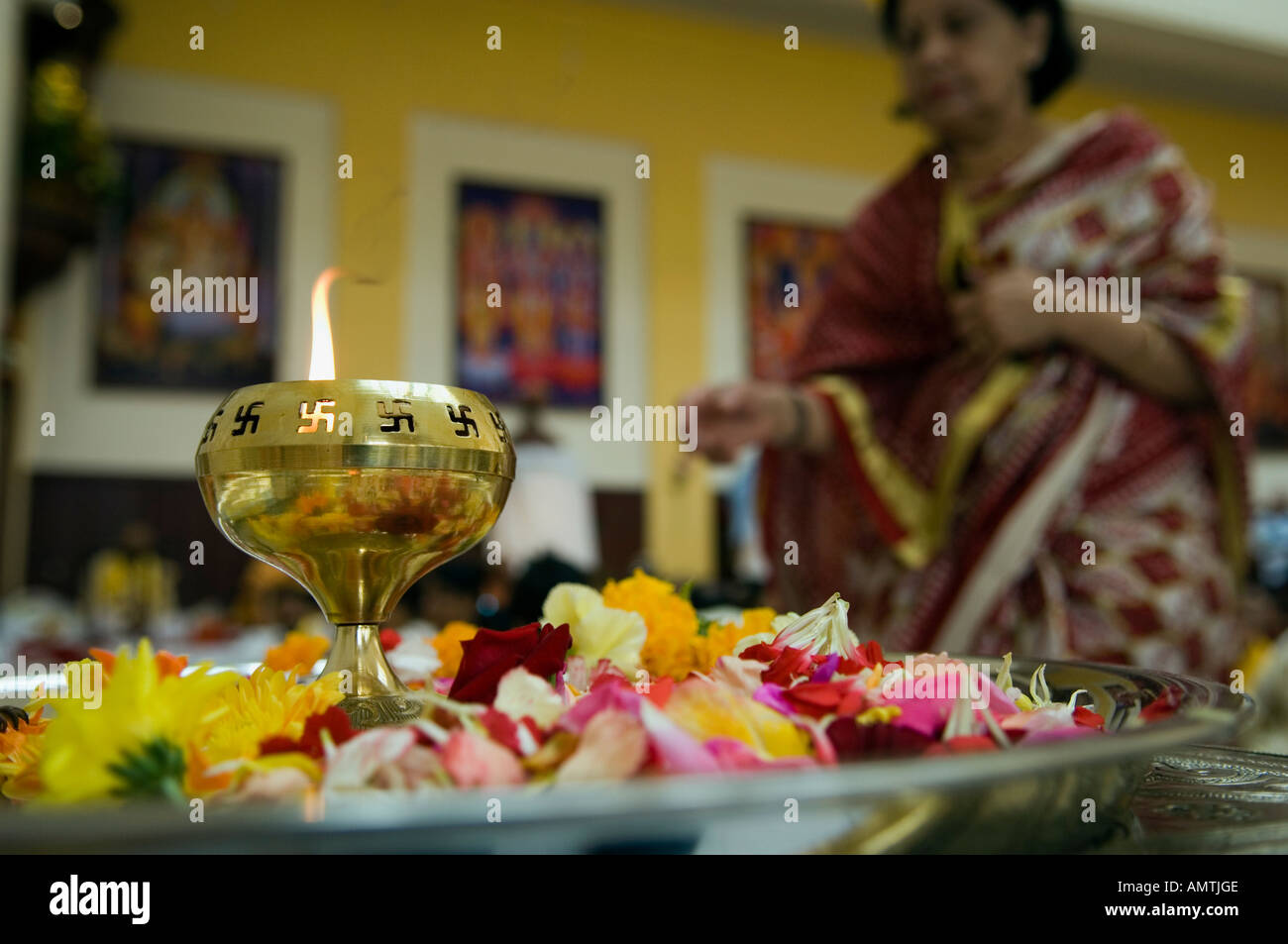 Devotee and offerings at Hindu temple Stock Photo - Alamy