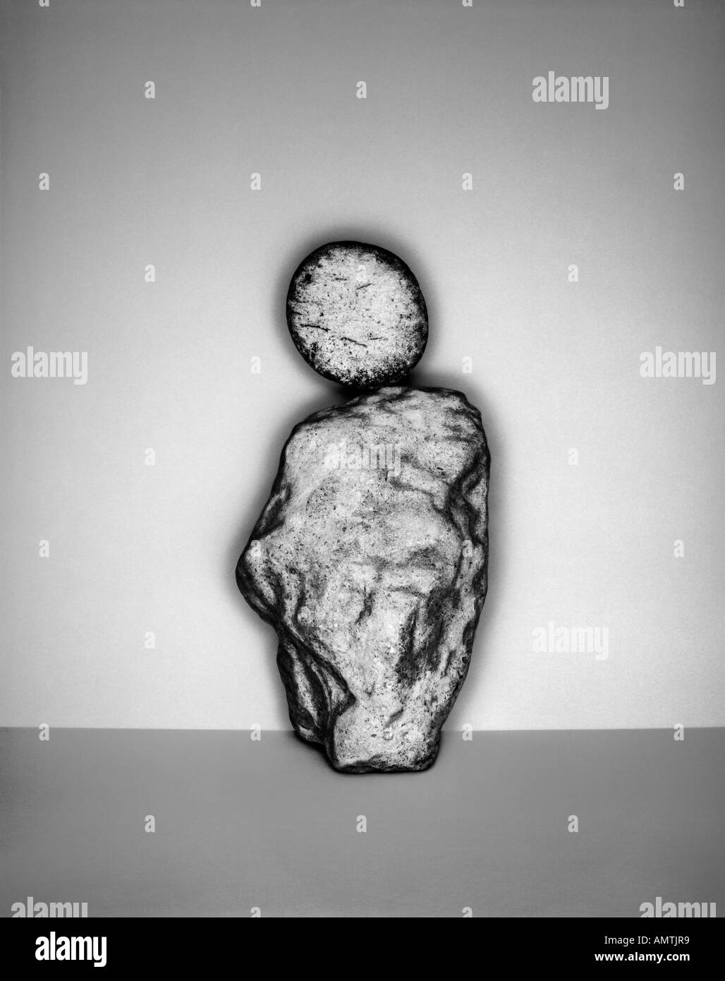 Standing Stone. A still life figure assembled from rocks appears ...