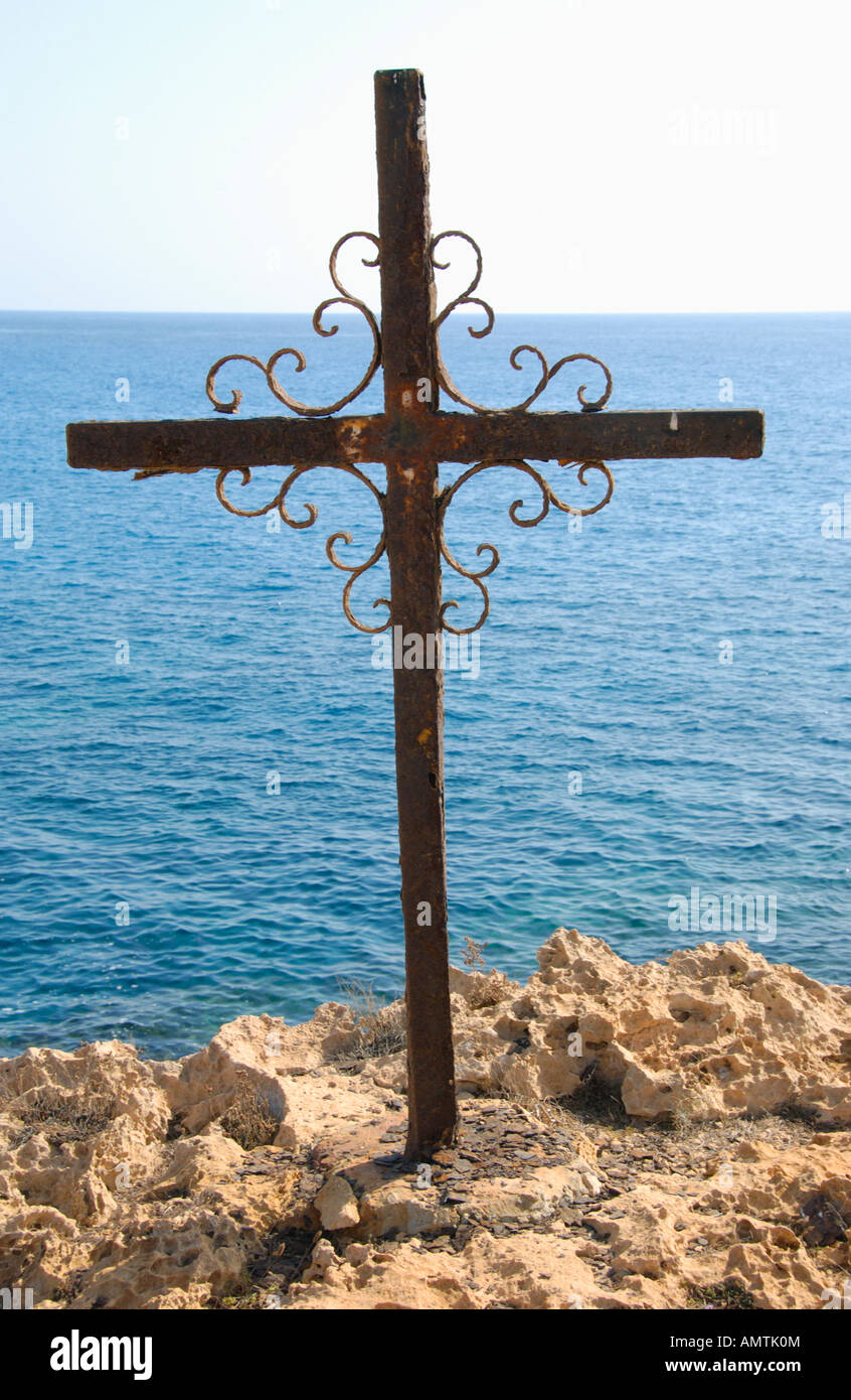 Metal cross looking out to sea at Cape Gkreko on the Mediterranean ...