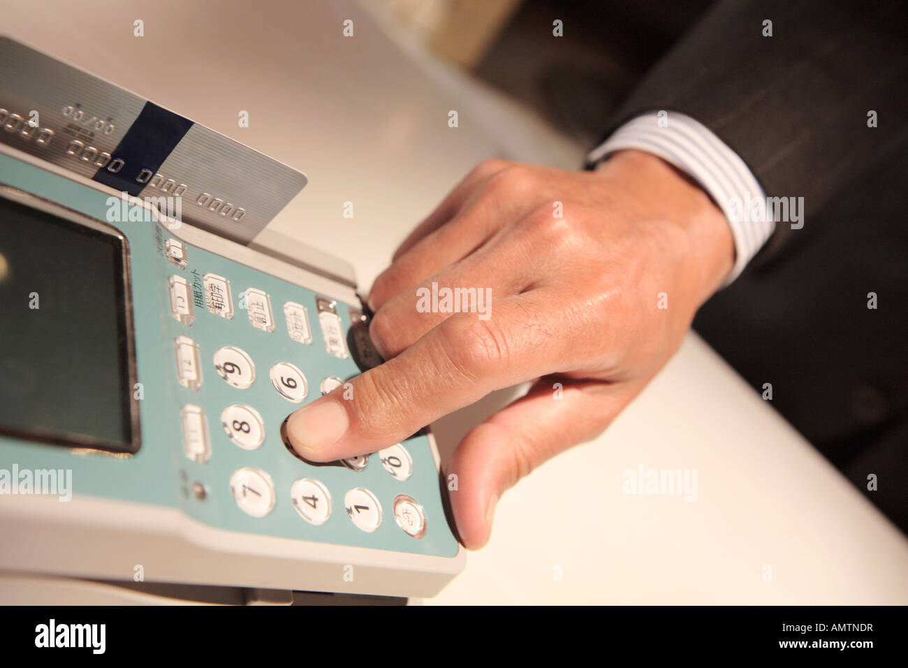 Finger pushing a button Stock Photo - Alamy