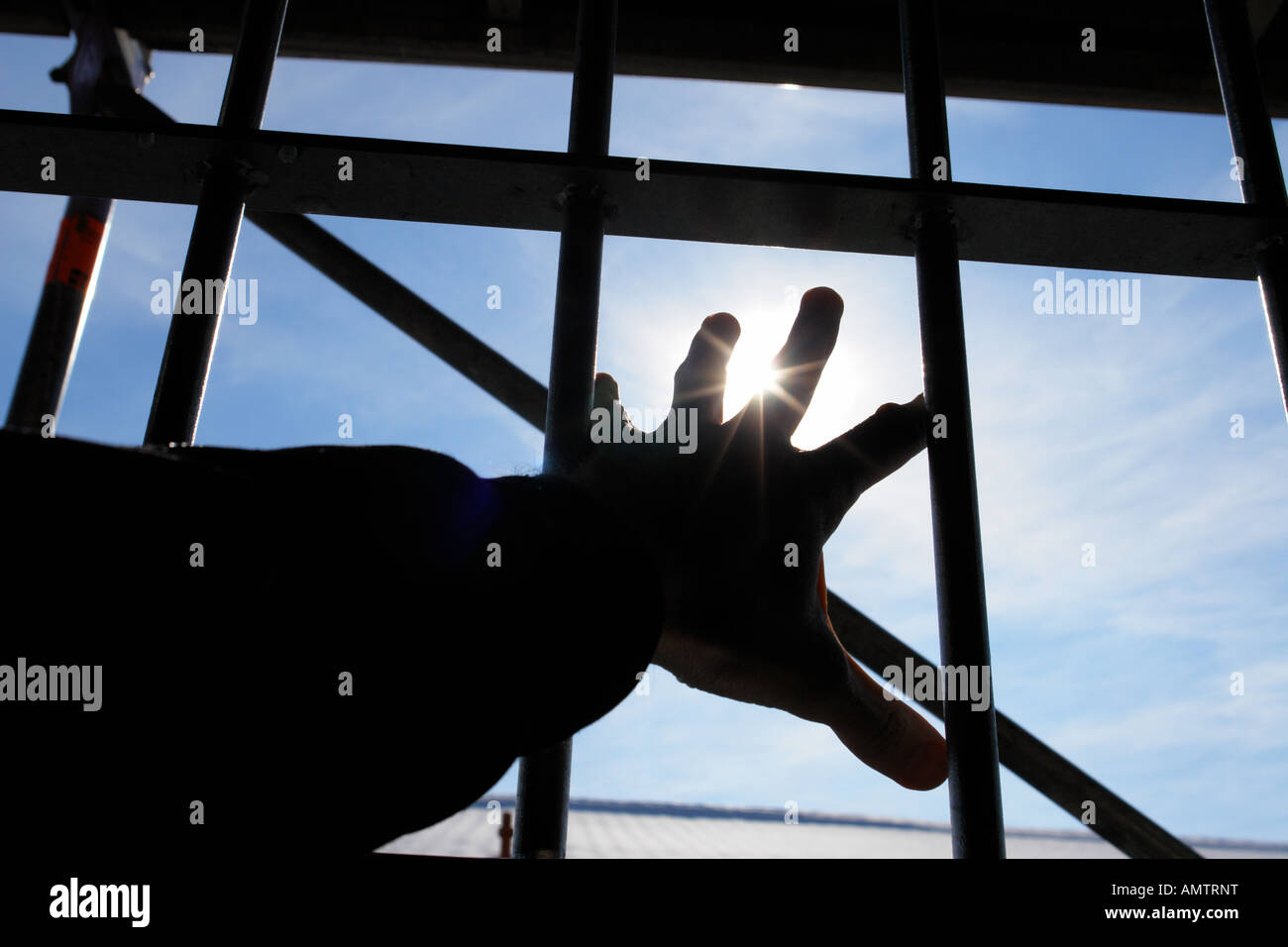 hand reaching for freedom Stock Photo - Alamy