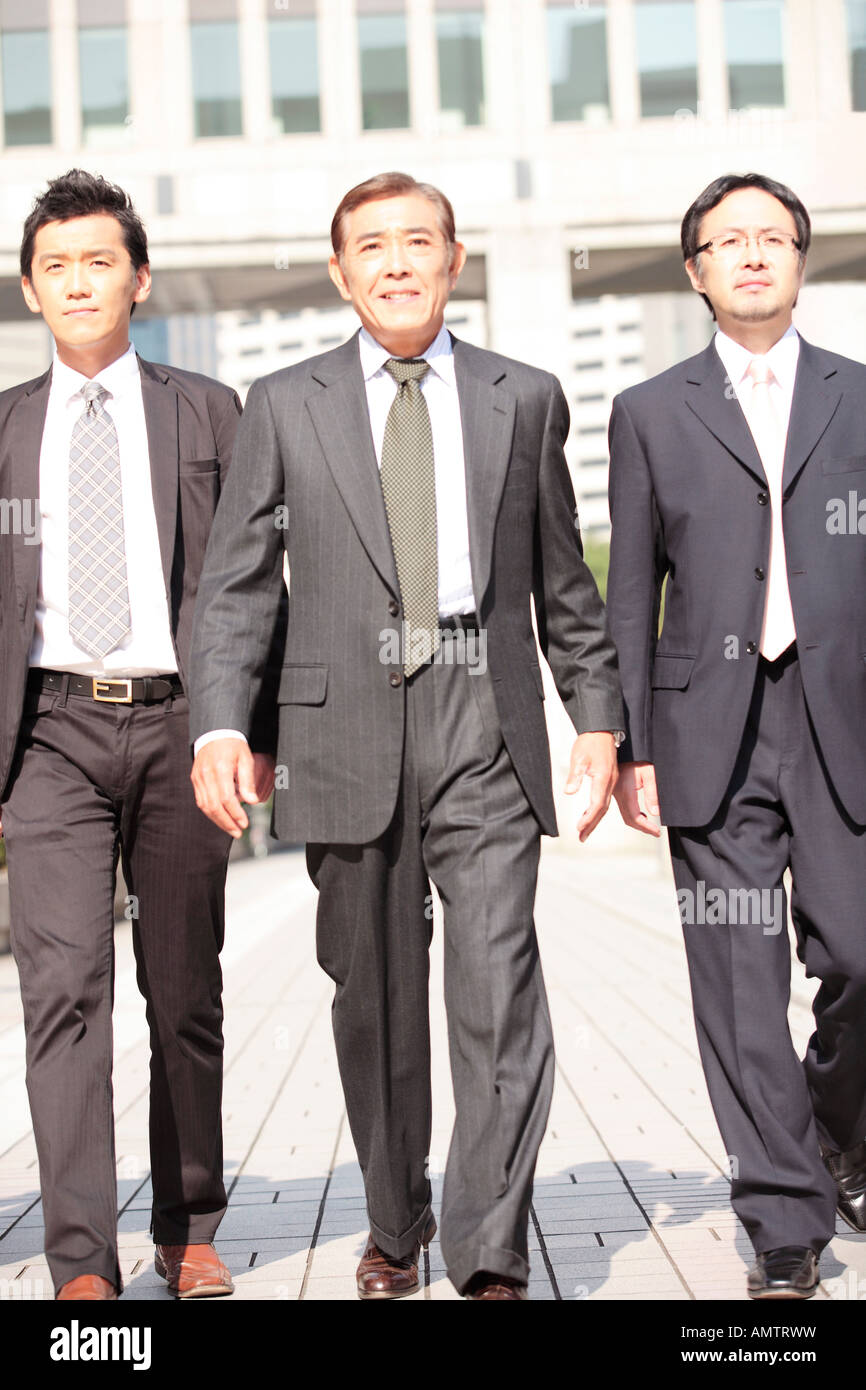 Japanese office workers walking on the street Stock Photo - Alamy