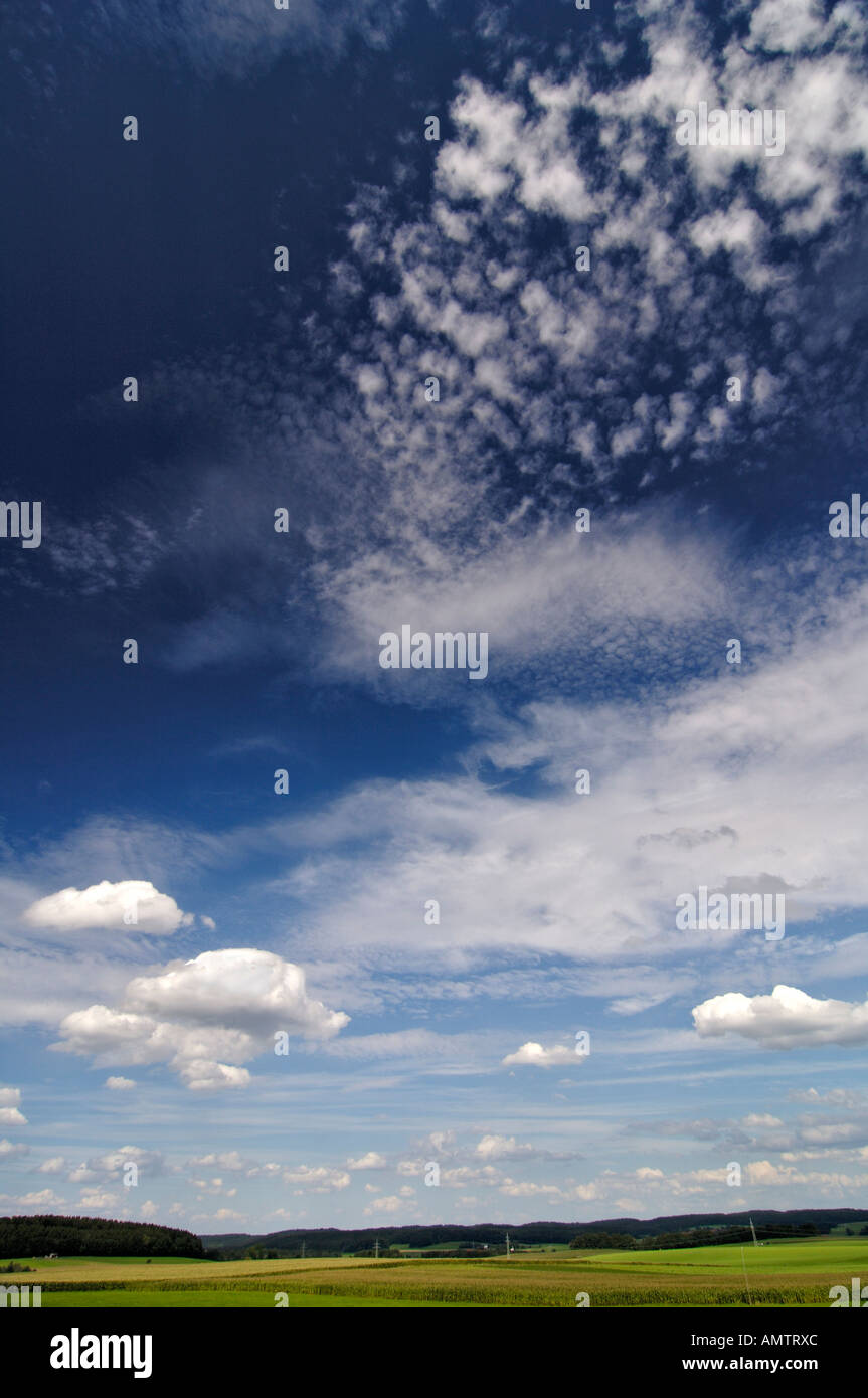 Cloudy sky with Cirrocumulus, Altocumulus and Cumulus clouds, Bavaria ...