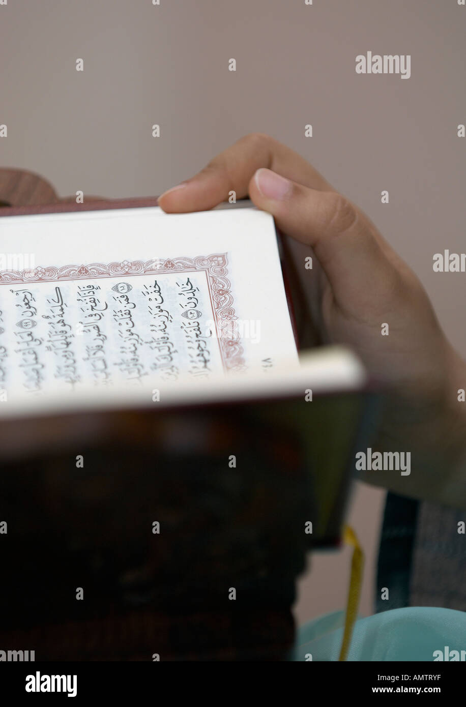 Hand quran hi-res stock photography and images - Alamy