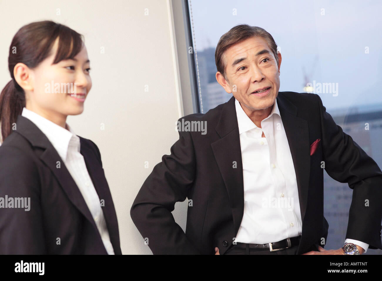 Japanese executive and office lady Stock Photo - Alamy