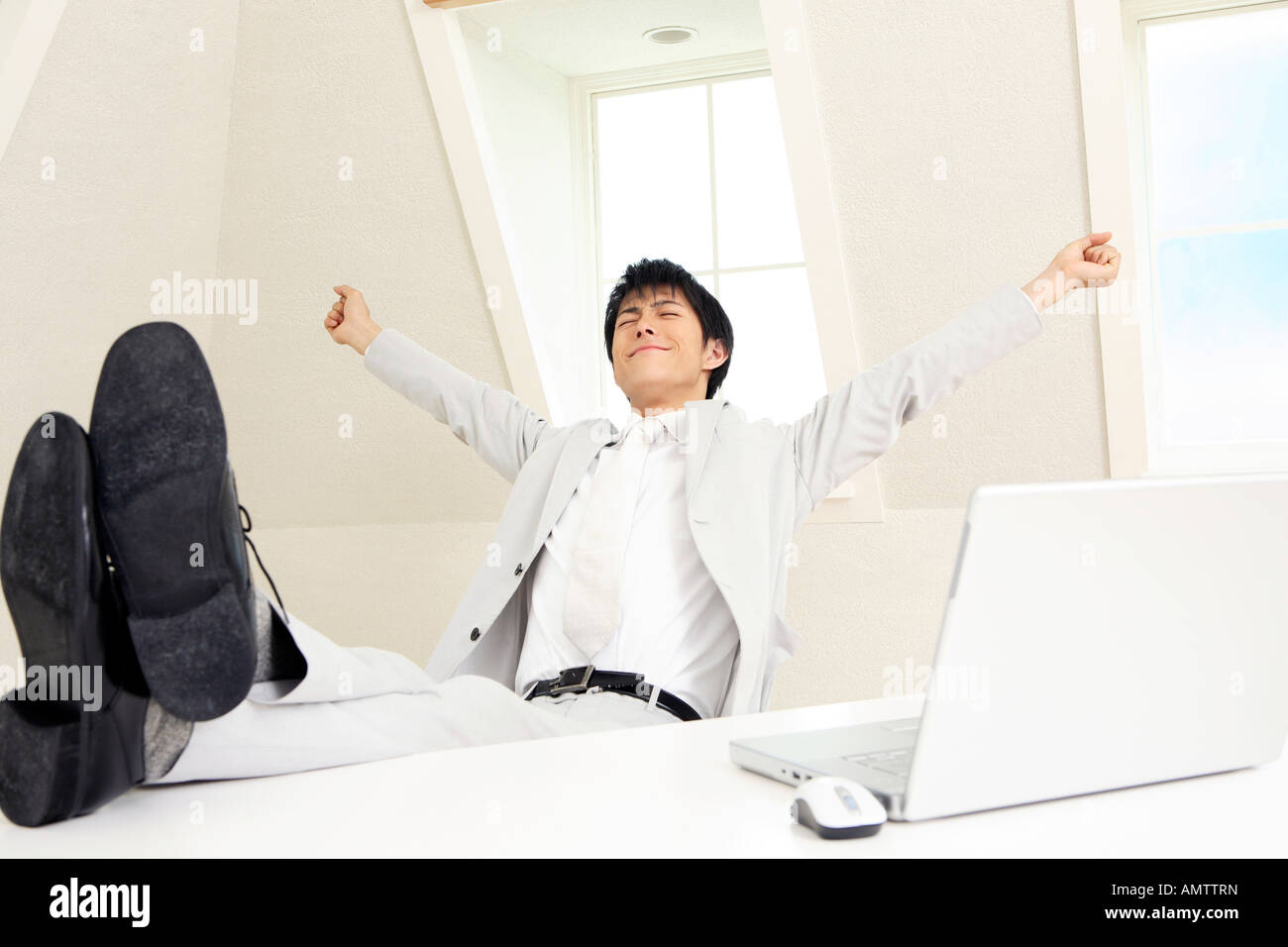 Office worker stretching back Stock Photo - Alamy