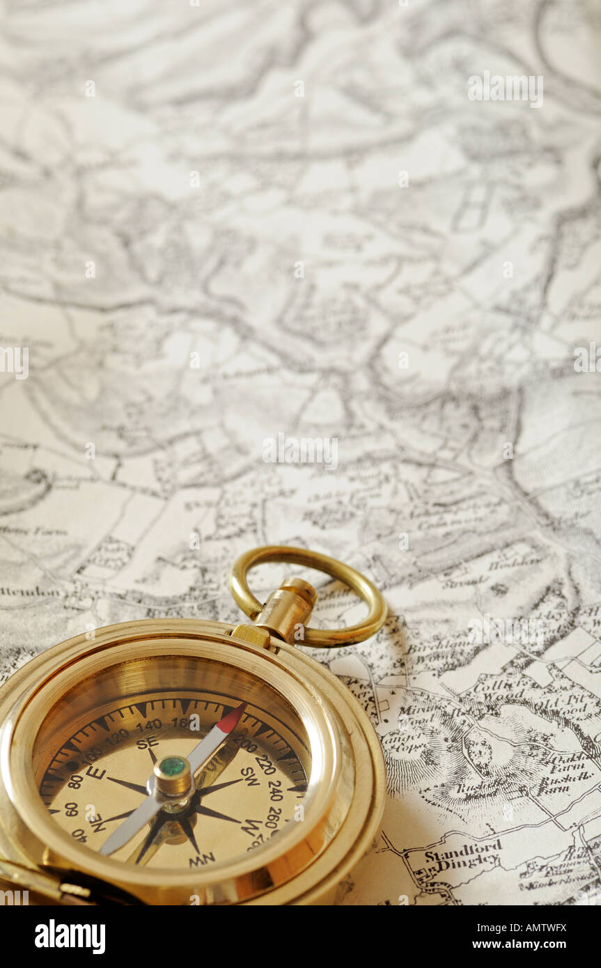 Compass and Map Stock Photo - Alamy