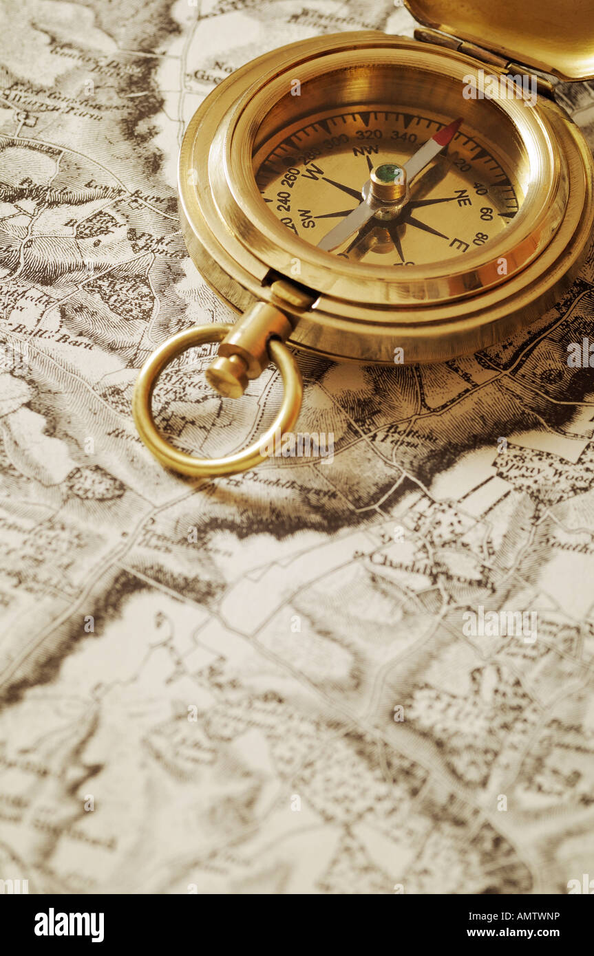 Compass and Map Stock Photo - Alamy