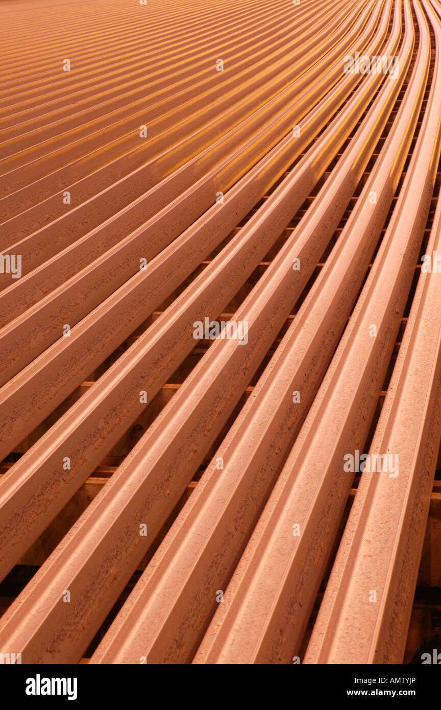 rails exposed in infinite lines Stock Photo - Alamy