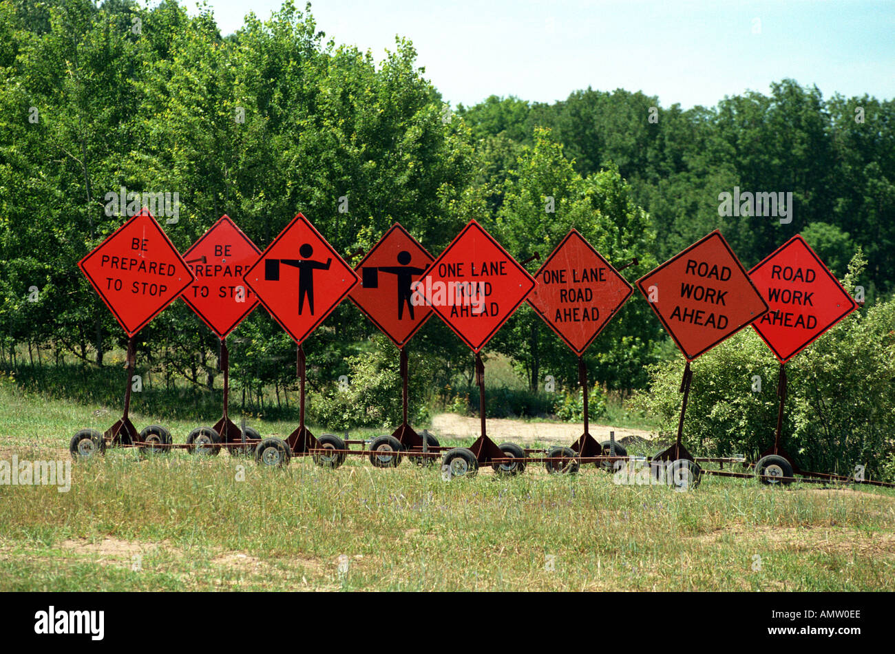 Highways signs stored along a road Stock Photo - Alamy