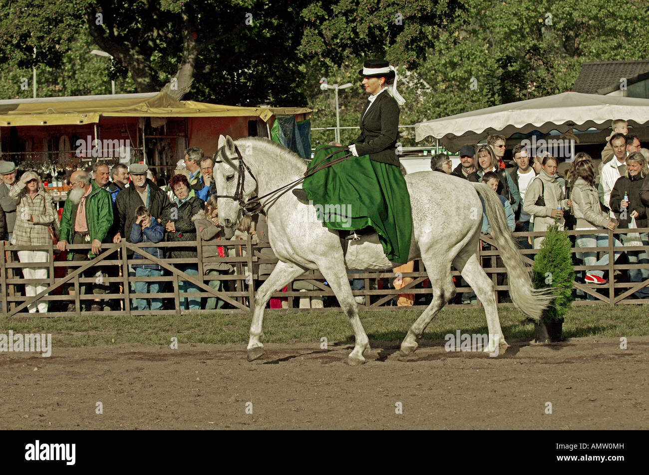 Woman riding side saddle hi-res stock photography and images - Alamy