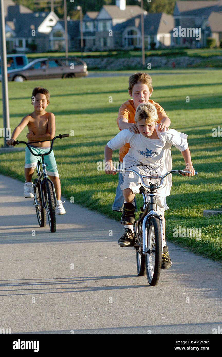Boys playing on their bikes hi-res stock photography and images - Alamy