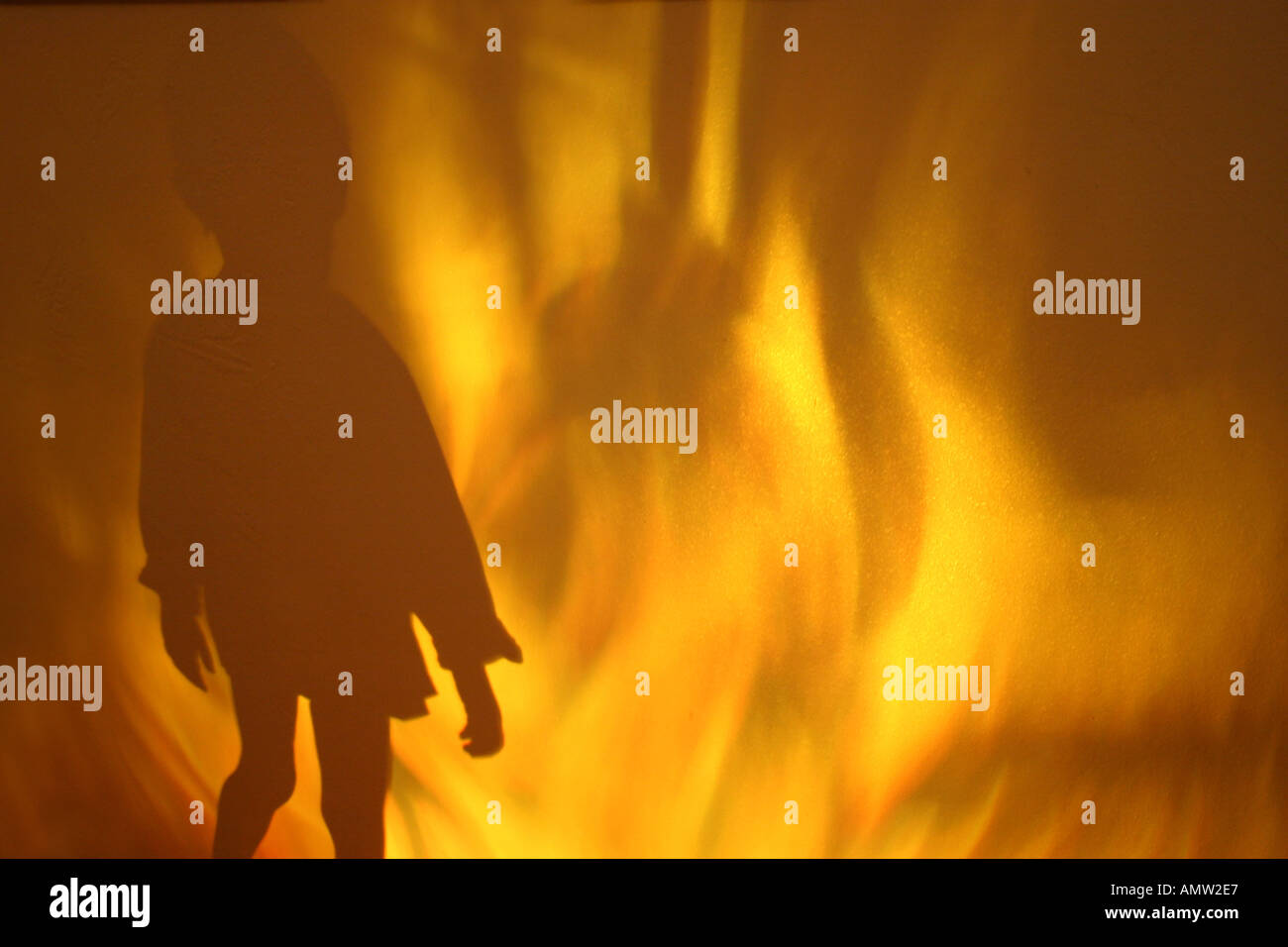 shadows child and fire Stock Photo - Alamy
