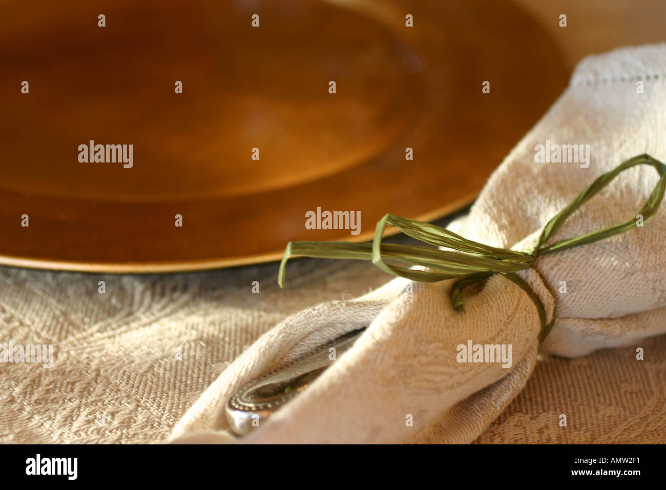 holiday table setting closeup with gold plate Stock Photo - Alamy