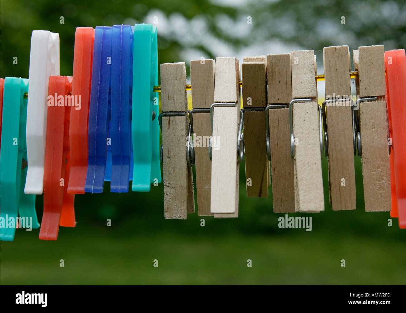 family of washing line pegs on washing line provoking concepts of ...