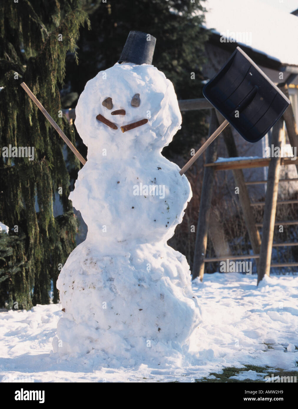 Snowman with shovel hi-res stock photography and images - Alamy