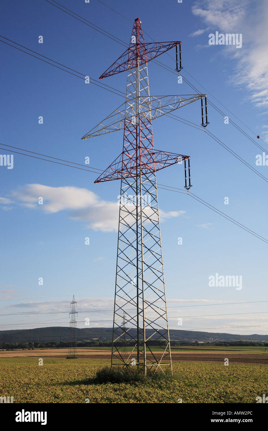 Power pole of a high tension line Stock Photo - Alamy