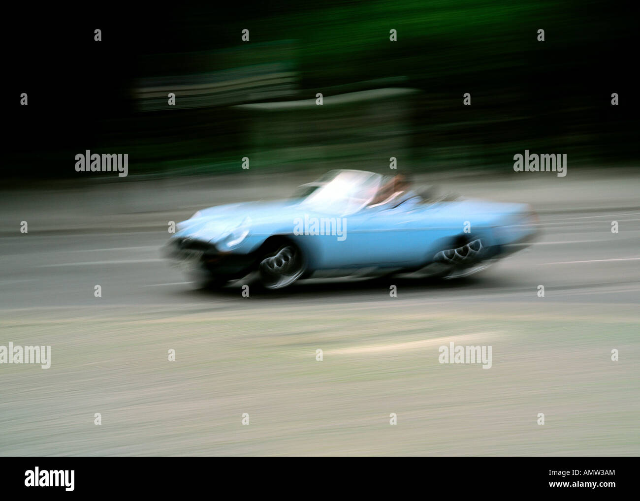 Driving blue car Stock Photo - Alamy