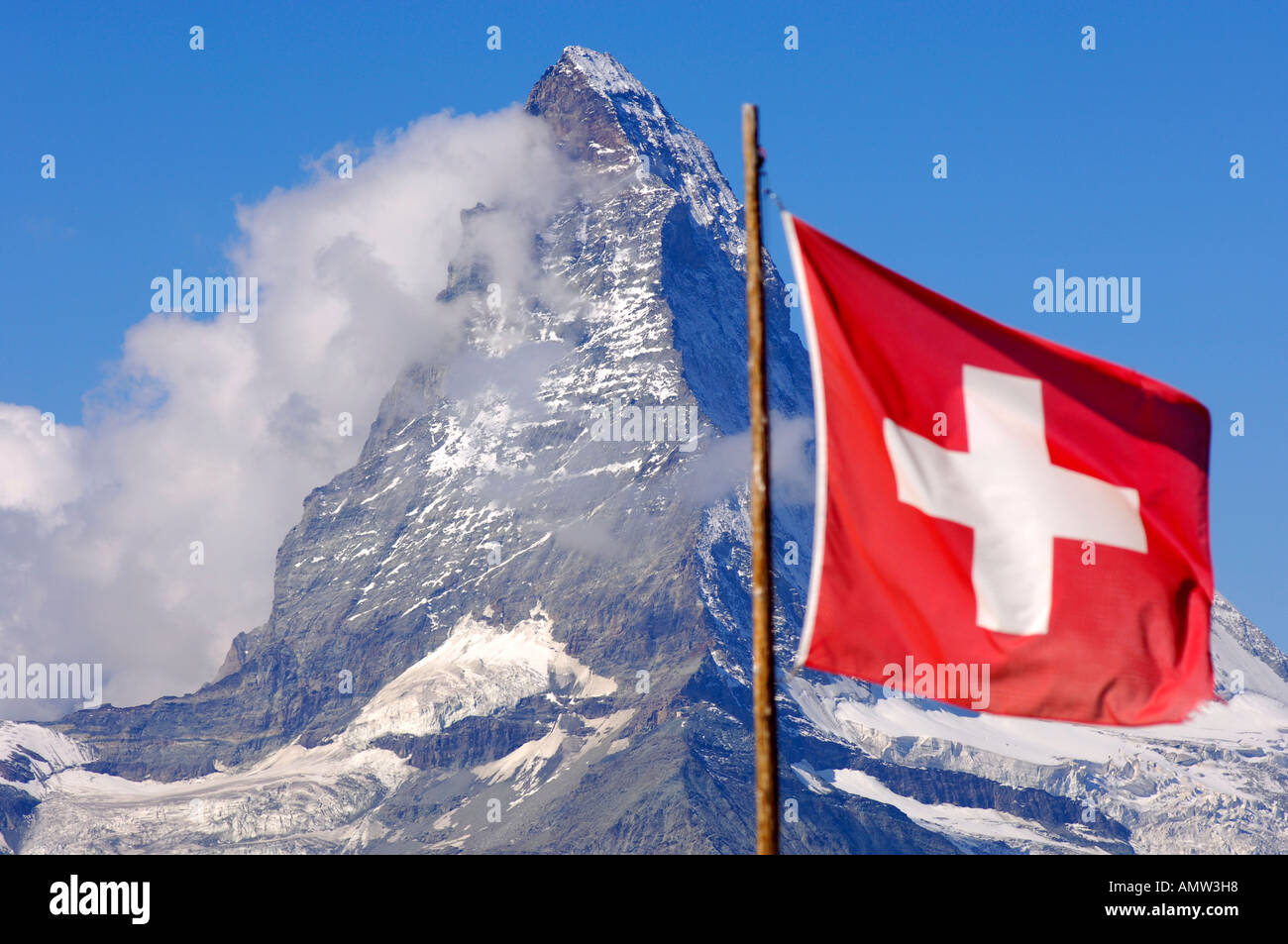 Flag of Switzerland against the Matterhorn, Mont Cervin, Zermatt ...