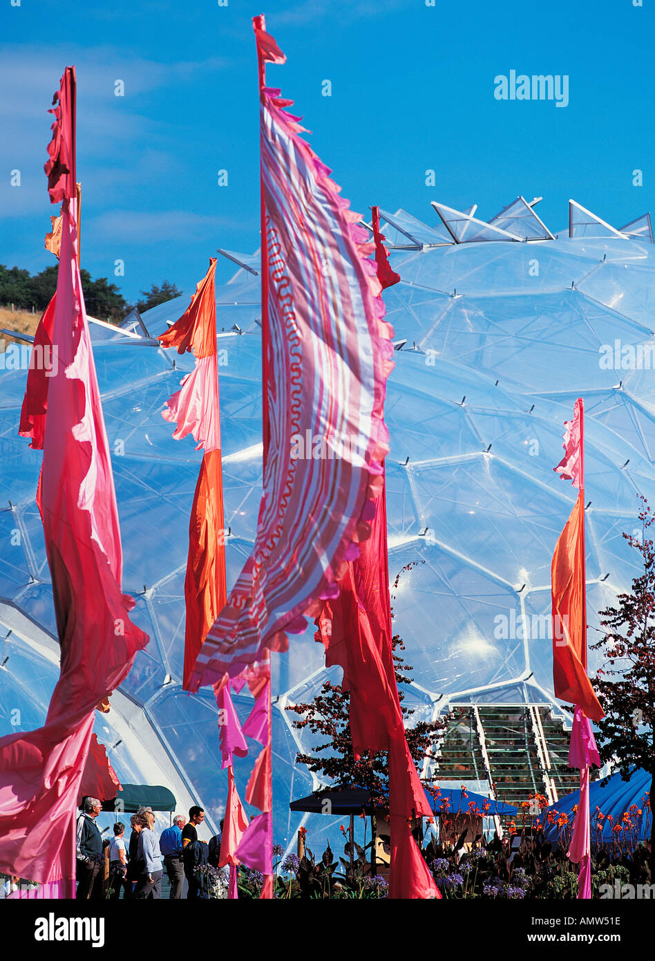Flags outside the dome of the humid tropics biome at the Eden Project ...