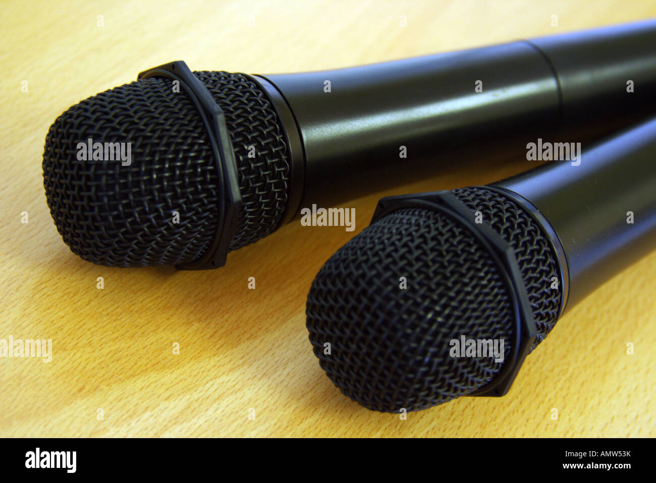 Black microphone on the table Stock Photo - Alamy