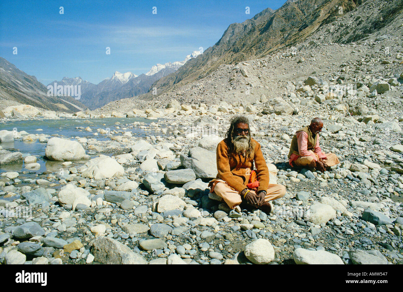 Sadhus holy men meditate at the source of the River Ganges at Gaumukh ...