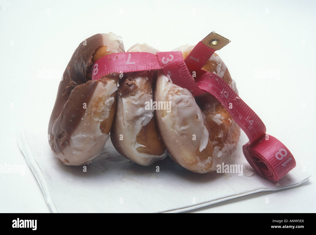 Tape Measure and donuts Stock Photo - Alamy