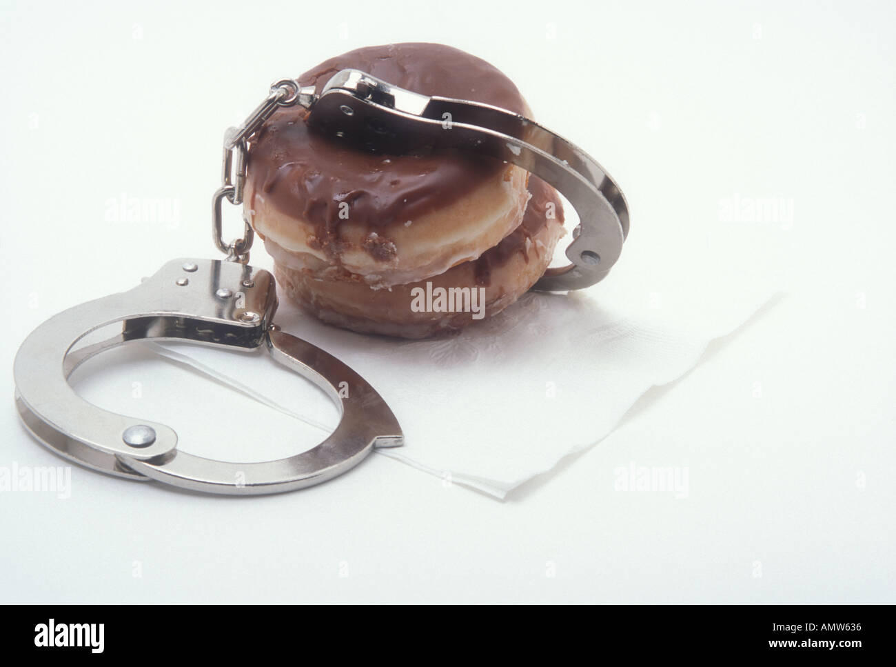 Donuts handcuffs hi-res stock photography and images - Alamy