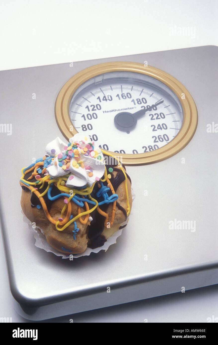 Fancy Cream puff on Scale Stock Photo - Alamy