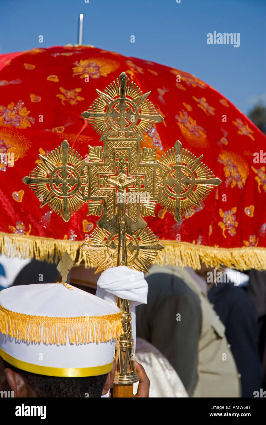 Deacon of the Ethiopian Orthodox Church carrying an ornate processional ...