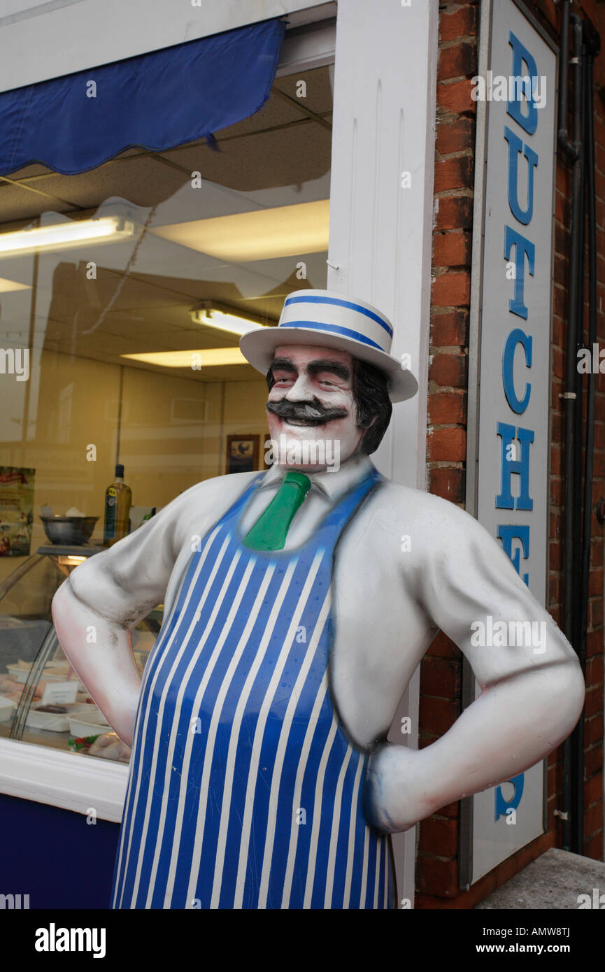 Life size model of a butcher standing outside his shop Stock Photo - Alamy