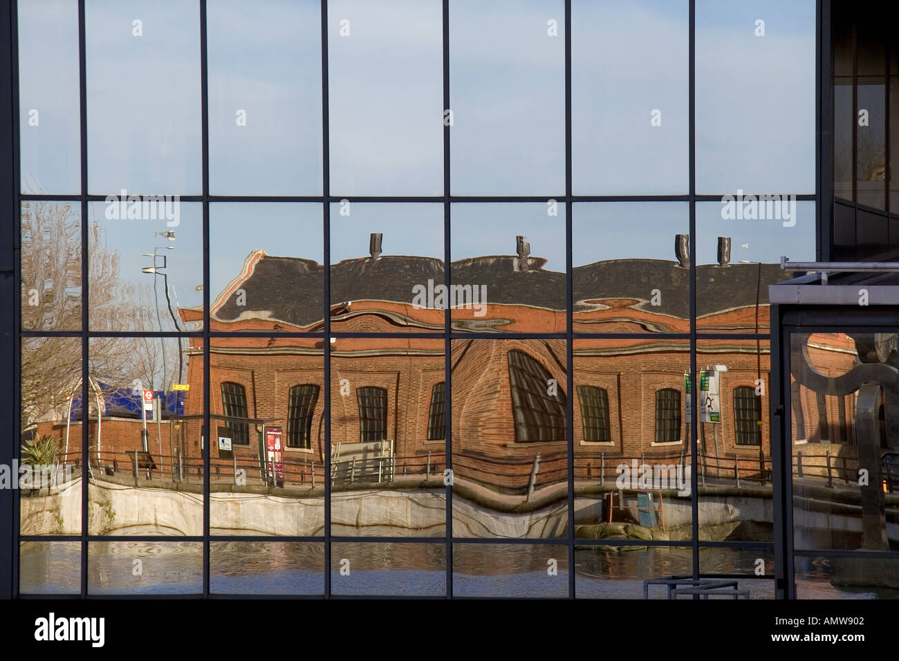 Brick buildings reflected hi-res stock photography and images - Alamy