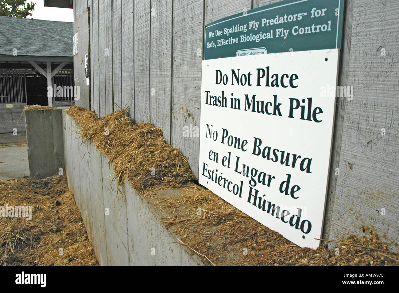 Muck pile sign in both Spanish and English at Equestrian event Stock ...