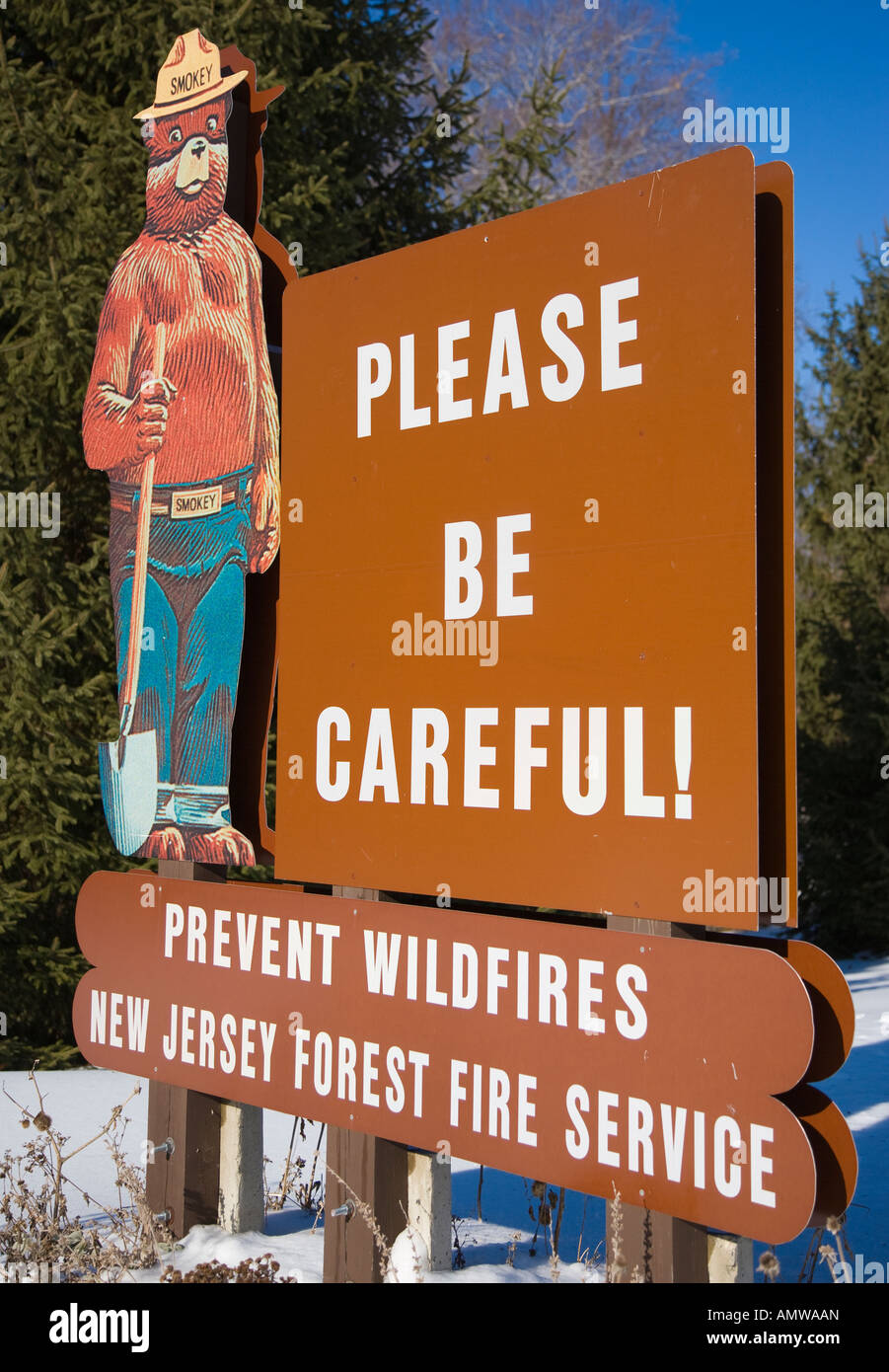 Sign warning about being careful about the dangers of forest fires ...