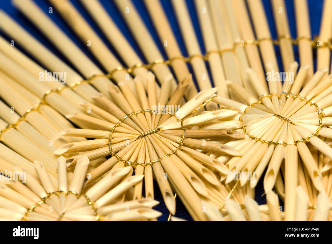 Straw star on blue underground Stock Photo - Alamy