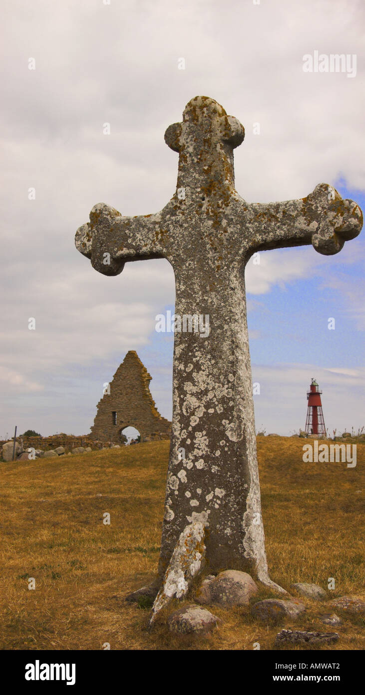 Stone cross in front of ruins of the chapel of saint Britta Bridgit ...