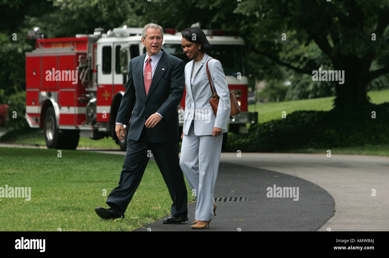President George W Bush and Secretary of State Condoleezza Rice walk to ...