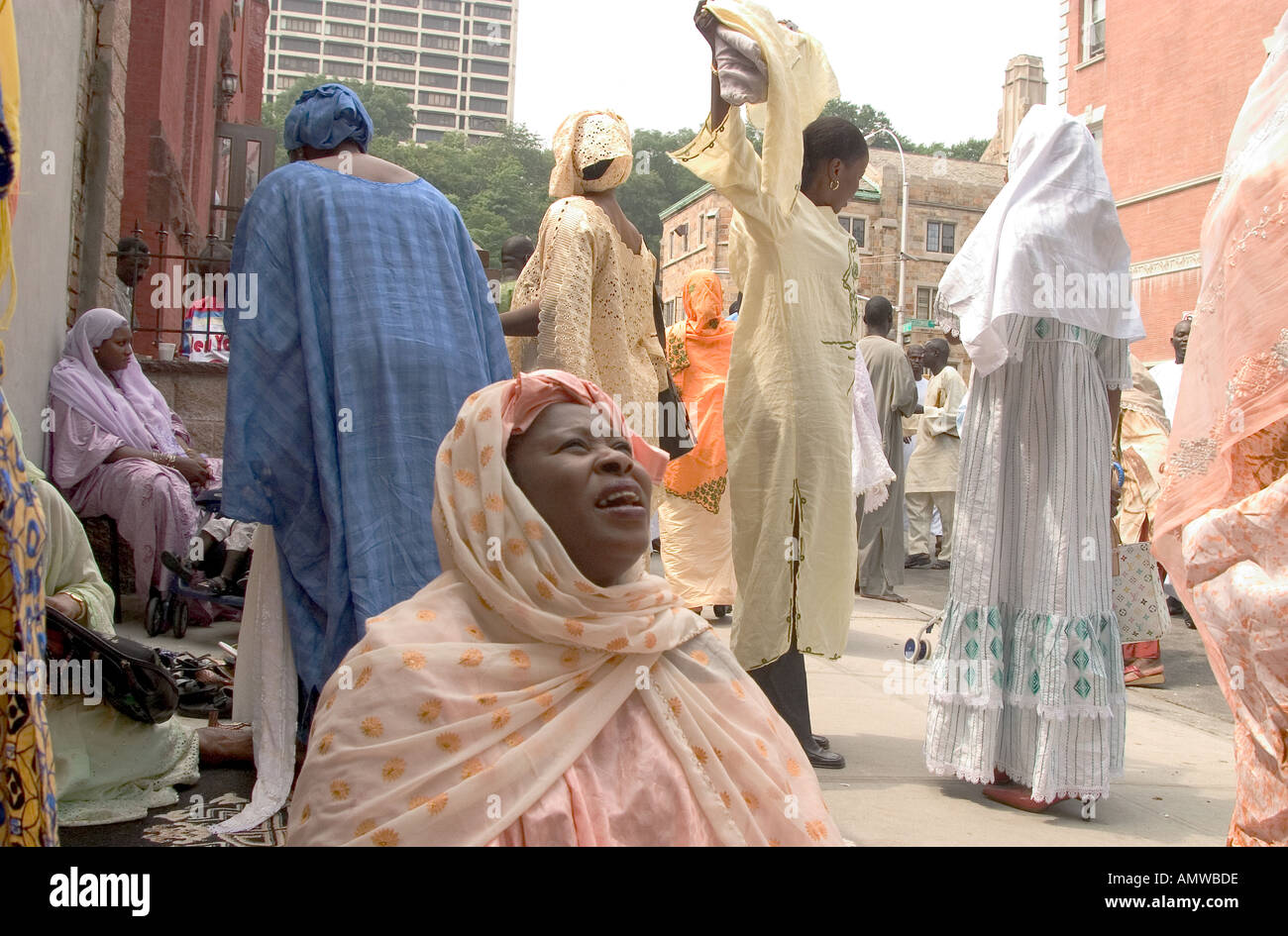 Senegalese wolof women gather to talk before praying outside the mosque ...